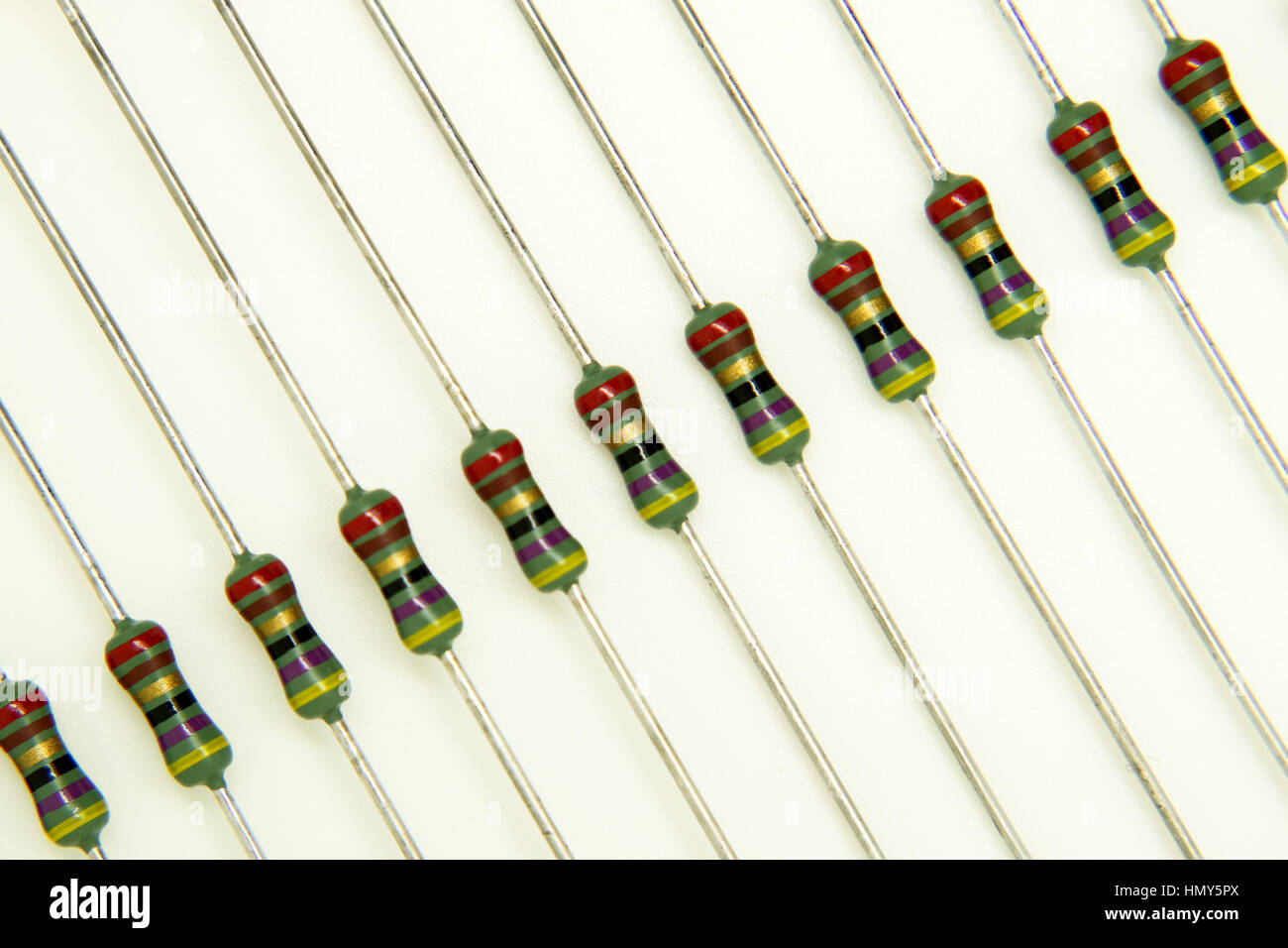 Thru hole mounted resistors on a white background Stock Photo - Alamy