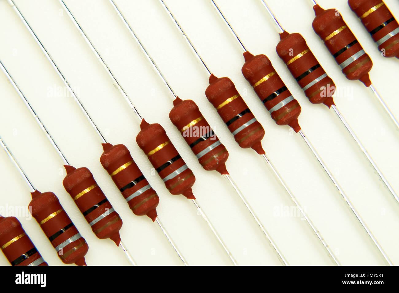 Thru hole mounted resistors on a white background Stock Photo - Alamy
