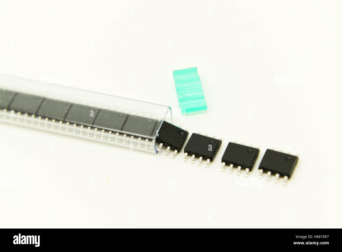 Integrated circuits and tube package on a white background Stock Photo ...