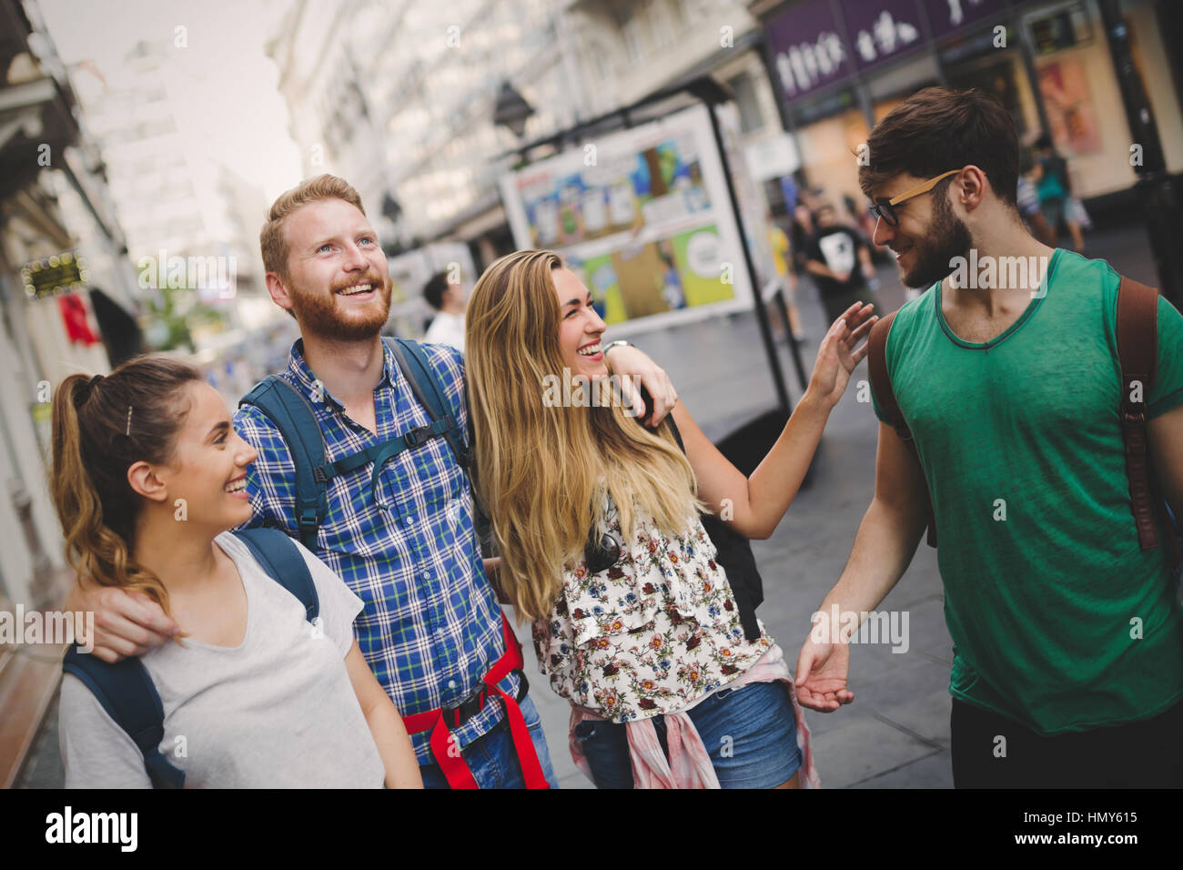 Happy group of tourists traveling and sightseeing together Stock Photo ...