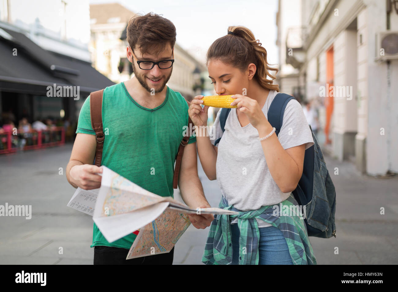 Young travelling people having fun and sightseeing in city Stock Photo ...