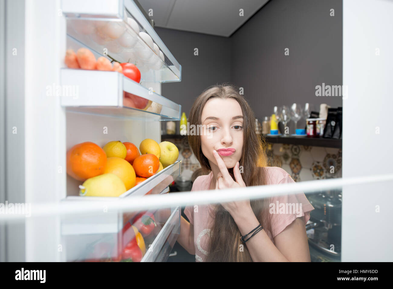 Woman taking food from the refrigerator. View from the inside Stock ...