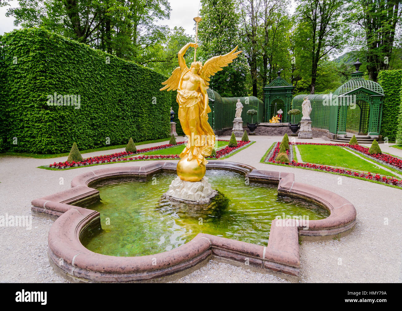 ETTAL, GERMANY - JUNE 5, 2016: Sculpture of gold angel in the park of ...