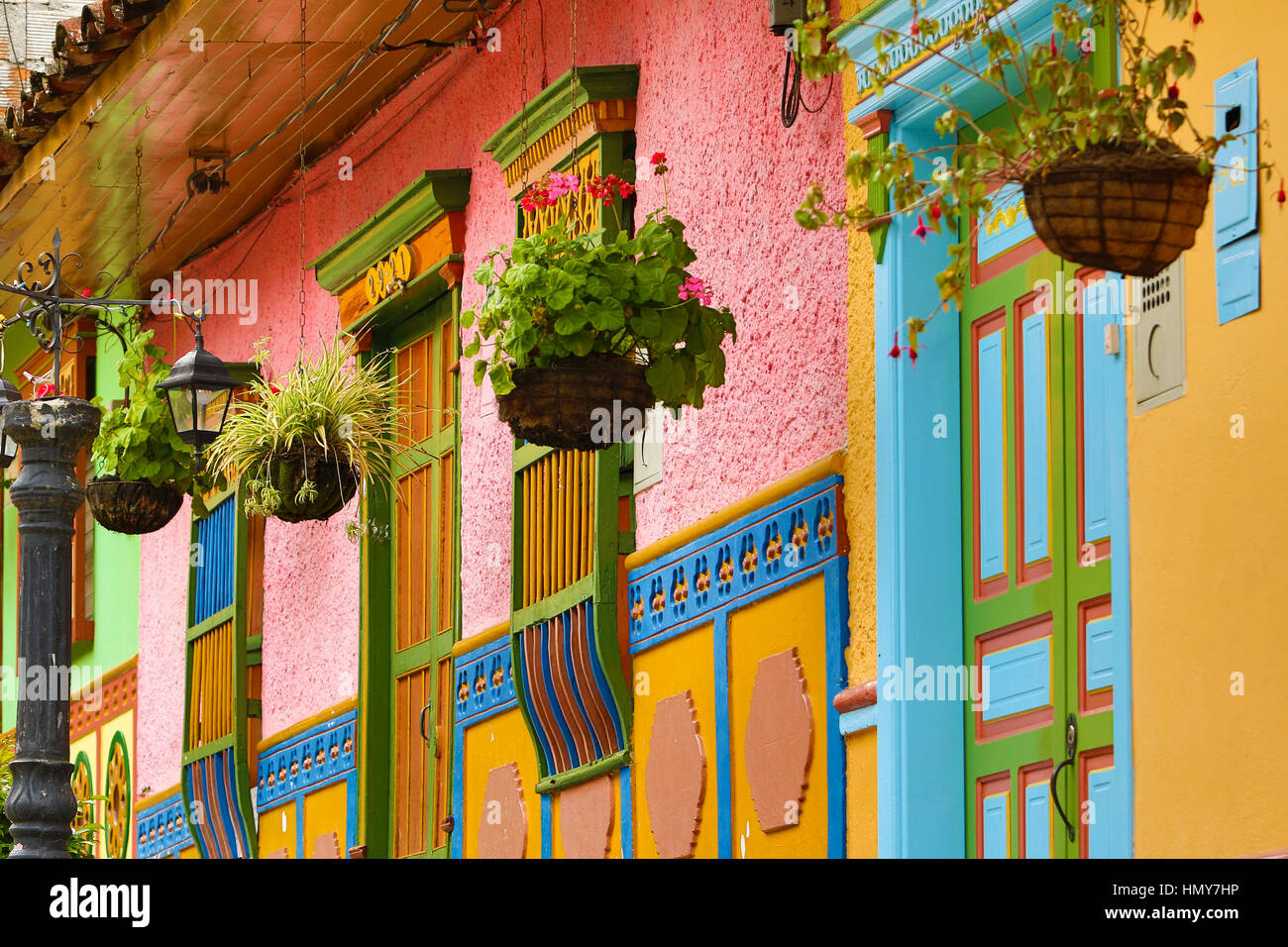 colonial architecture with colorfully painted houses and cobble stone ...