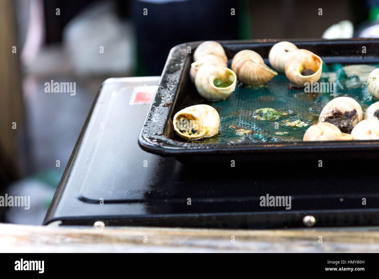 Preparation snails. Baked snails. Fried snails White snails Stock Photo ...