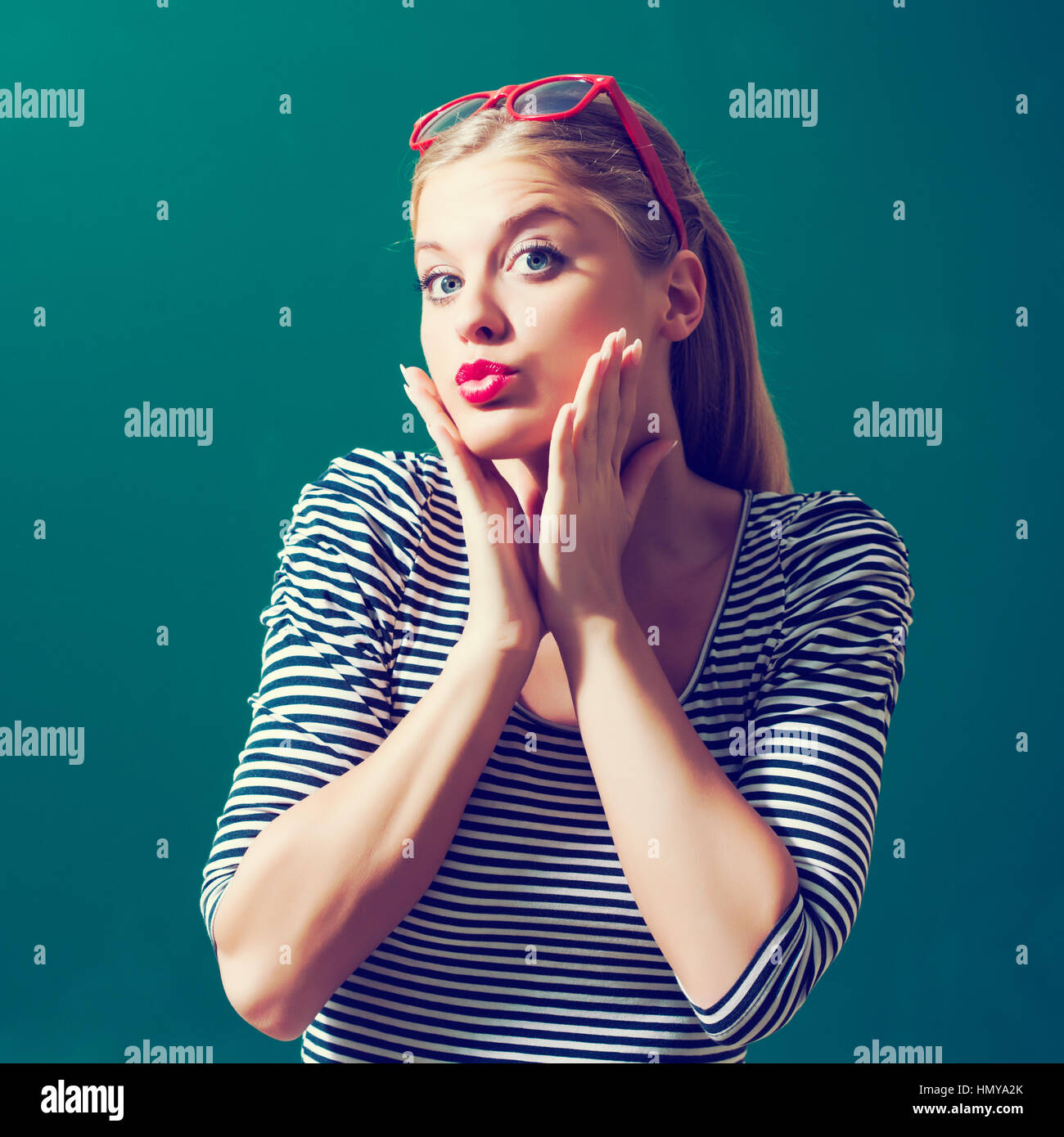 Young girl sending kiss Stock Photo - Alamy