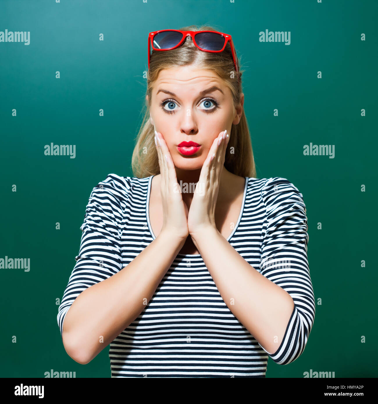 Woman making surprised face hi-res stock photography and images - Alamy