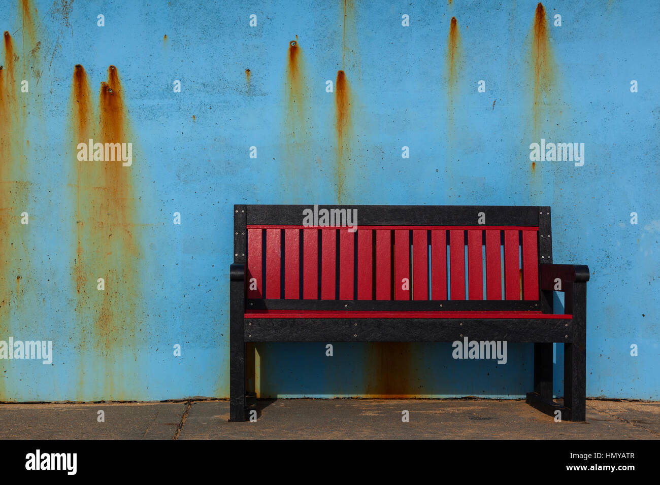 Bright red bench on hi-res stock photography and images - Alamy