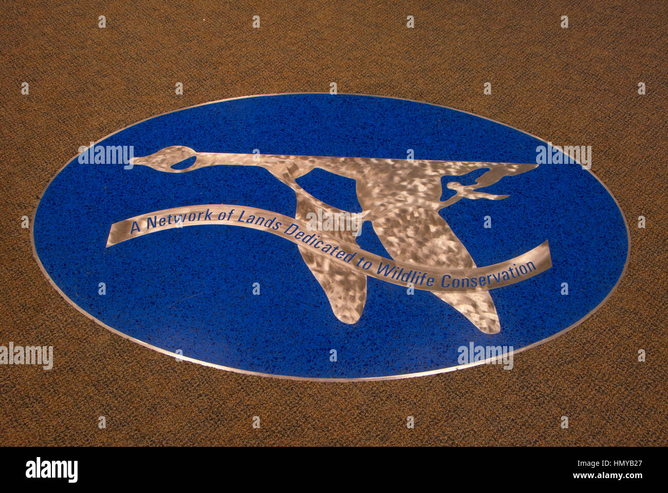 USFWS symbol on floor of Visitor Center, William Finley National ...