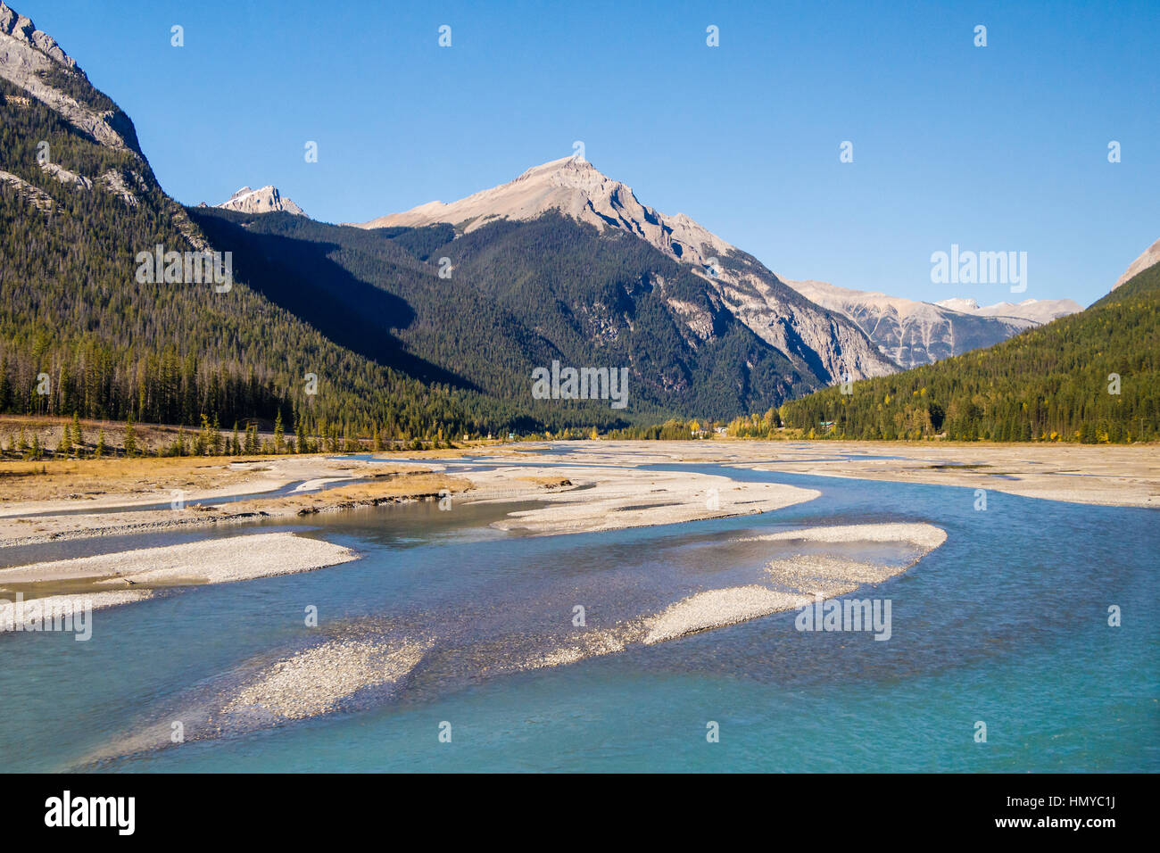 The Rocky Mountains that boarder Bow River in Alberta, Canada Stock ...