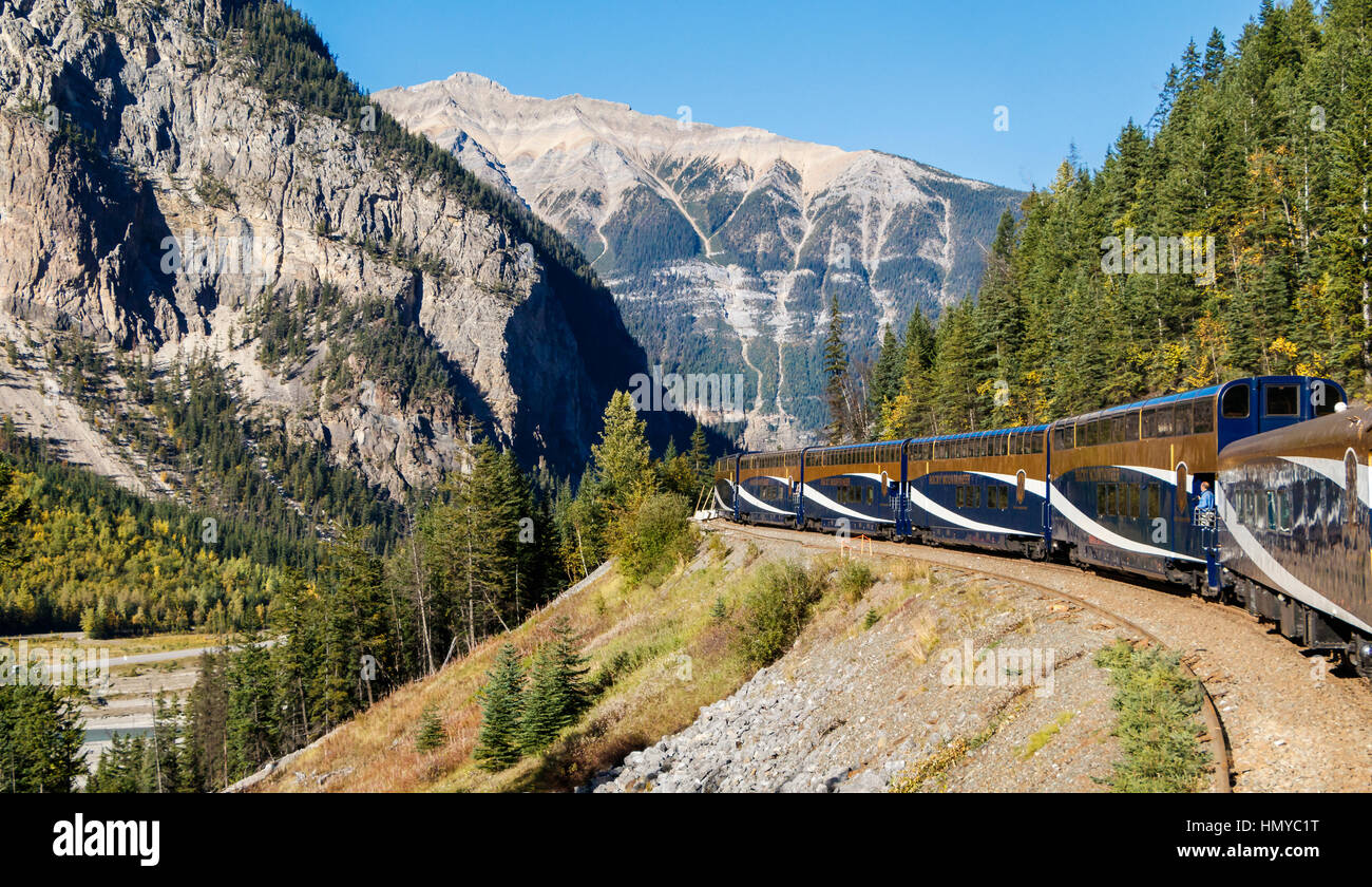 The Rocky Mountaineer railway train winds it's way through Banff ...