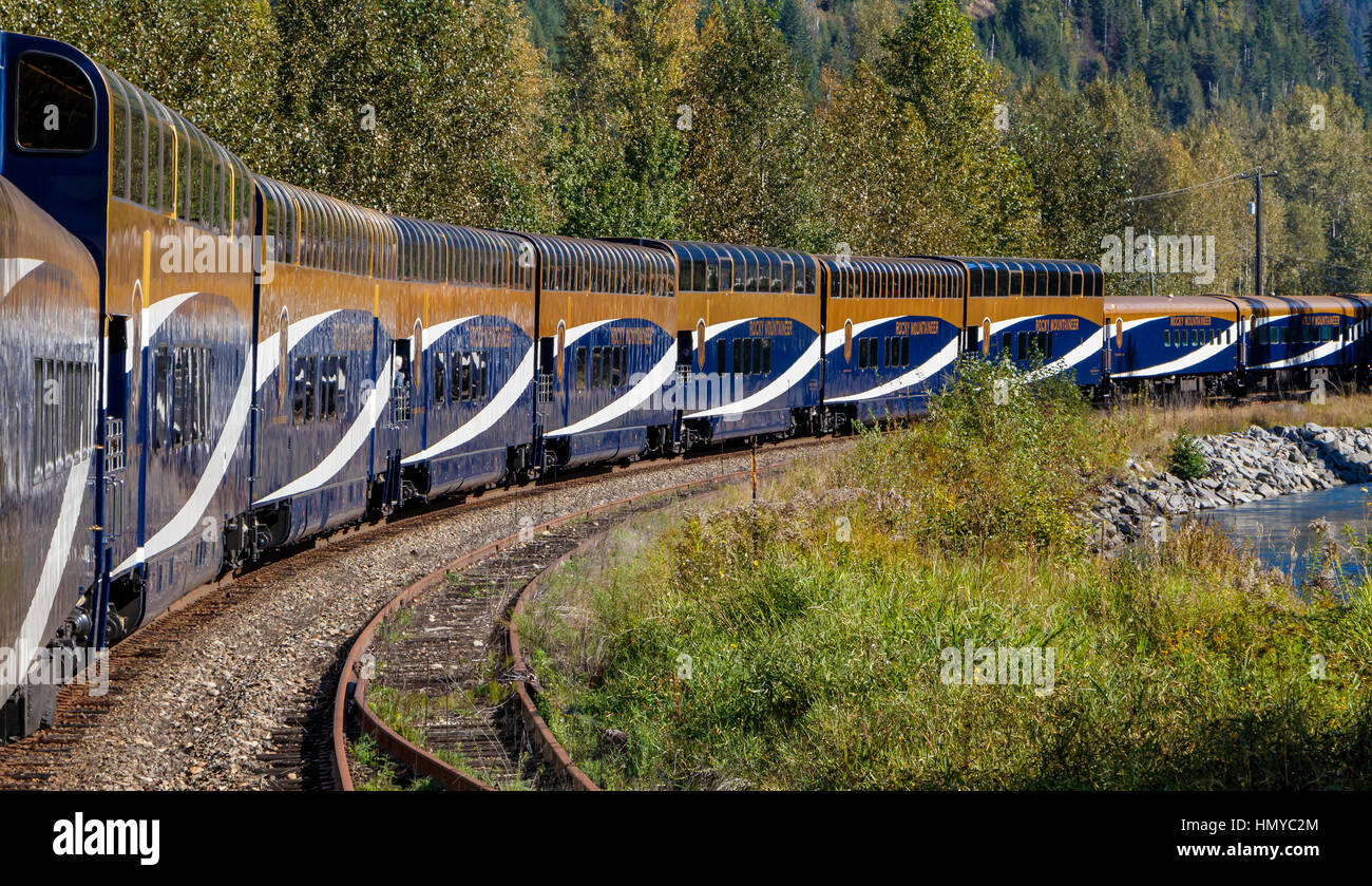 The Rocky Mountaineer railway train winds it's way through Banff ...