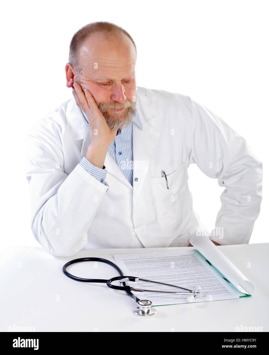 Portrait of confident thinking doctor on white background Stock Photo ...