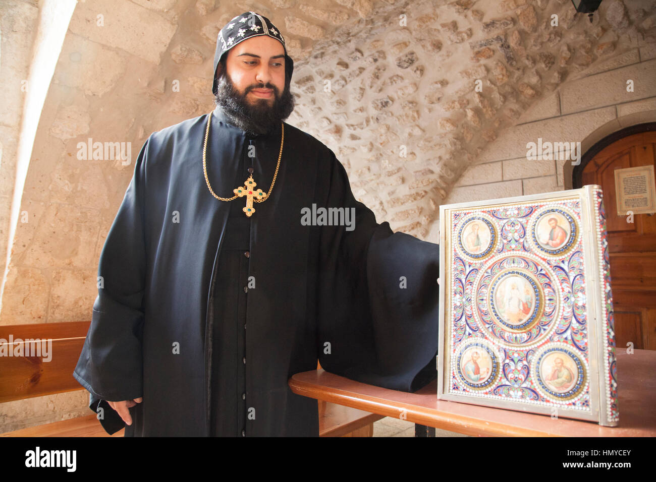 Jerusalem, Israel - 26 November, 2013: Syrian Orthodox priest with ...