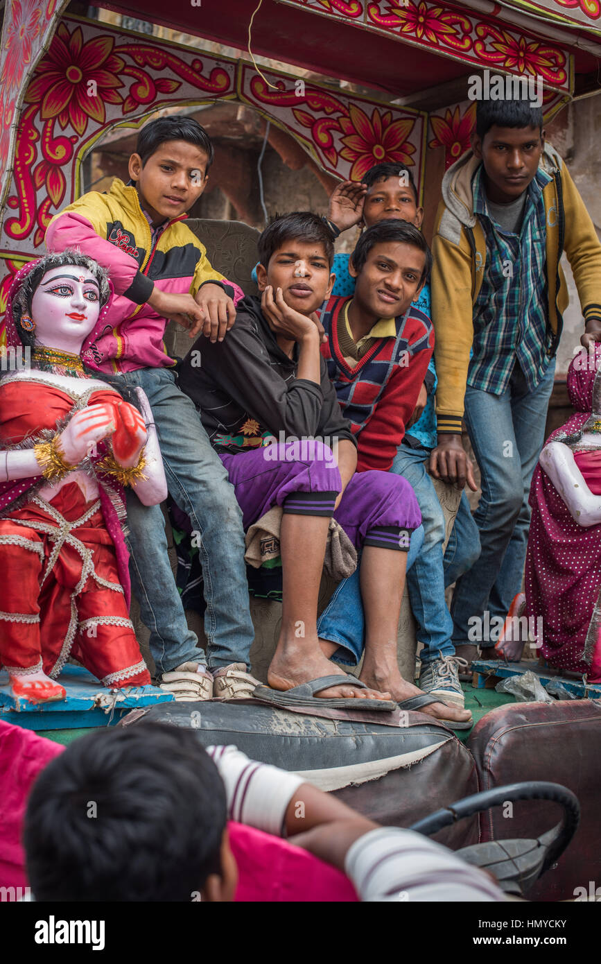 Young indian children sat in the back of a decorated vehicle Stock ...