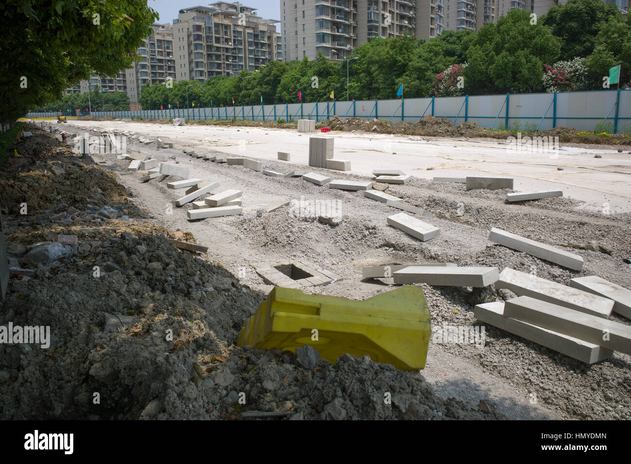 Kerb blocks lying on ground during road under construction, Suzhou ...