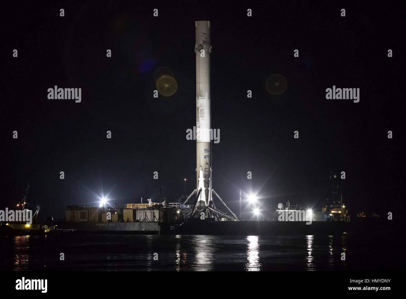 The SpaceX Falcon 9 reusable rocket is returned to port onboard the ...