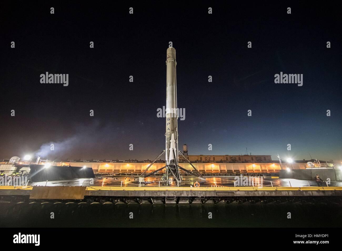 The SpaceX Falcon 9 reusable rocket is returned to port onboard the ...