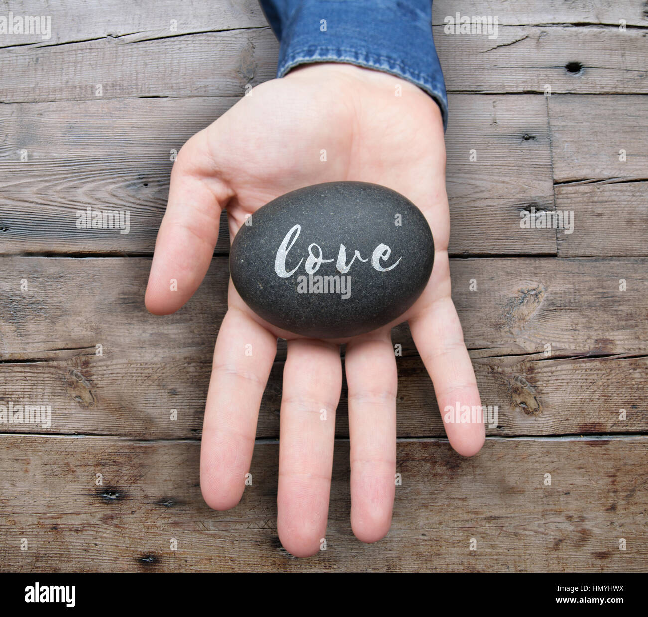 word love written on stone Stock Photo - Alamy