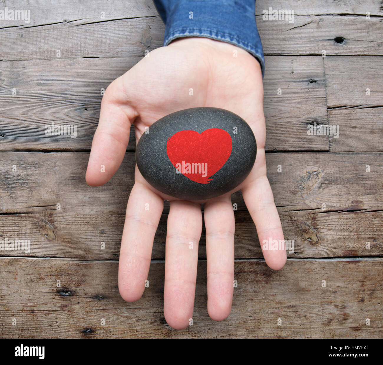 Heart shape with hand hi-res stock photography and images - Alamy