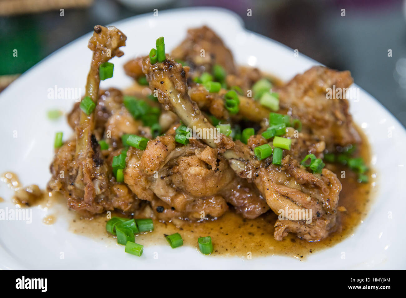 Roasted calf chicken with sauce surve on plate Stock Photo - Alamy