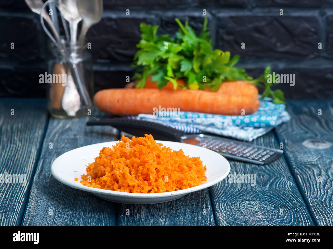 carrot on plate and on a table Stock Photo - Alamy