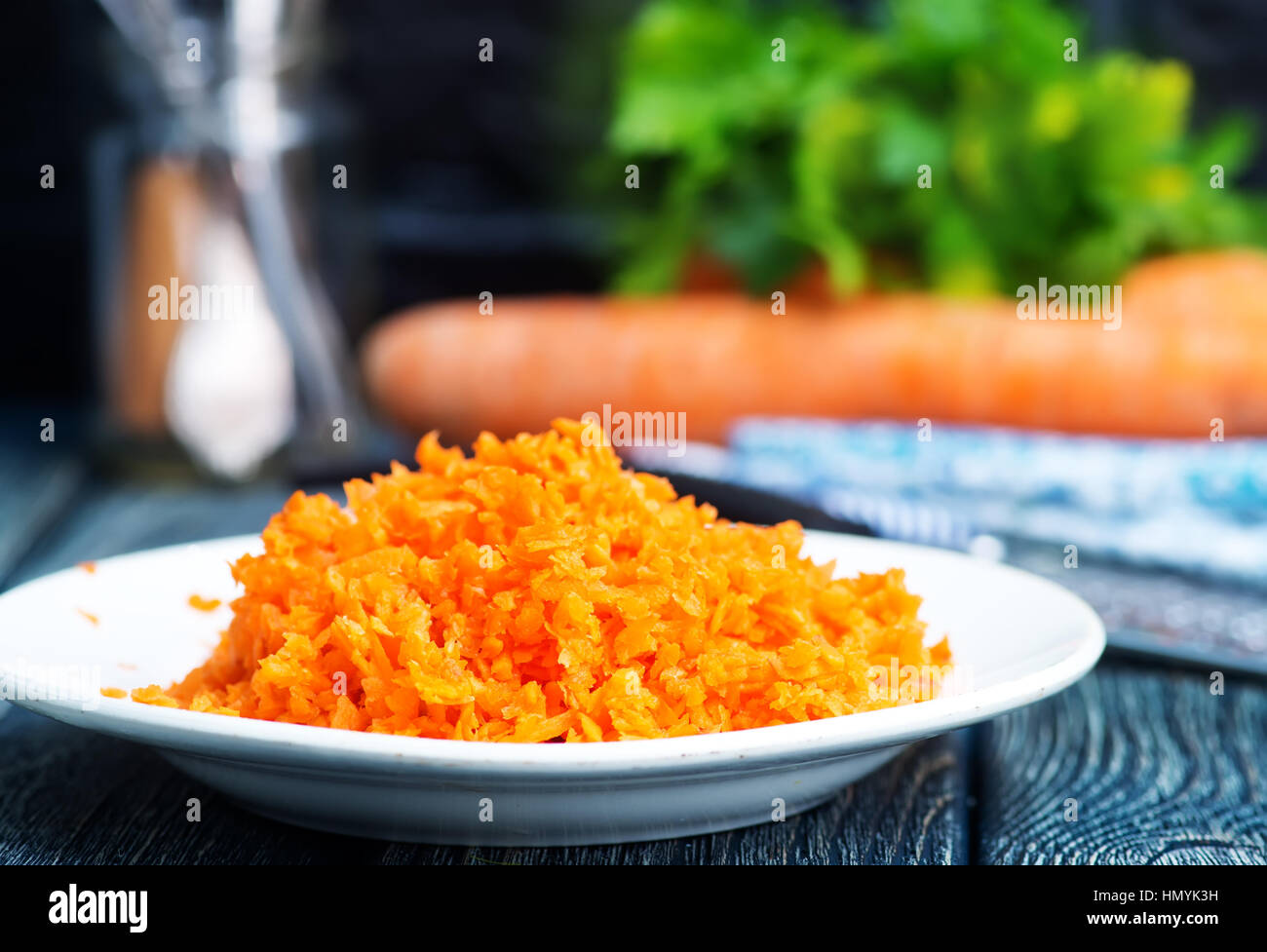 carrot on plate and on a table Stock Photo - Alamy