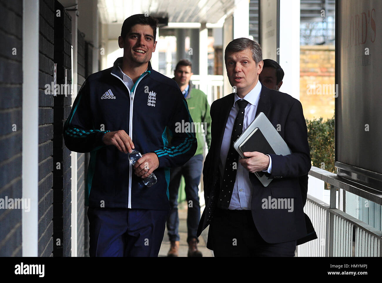 Former England captain Alastair Cook arrives for the press conference ...