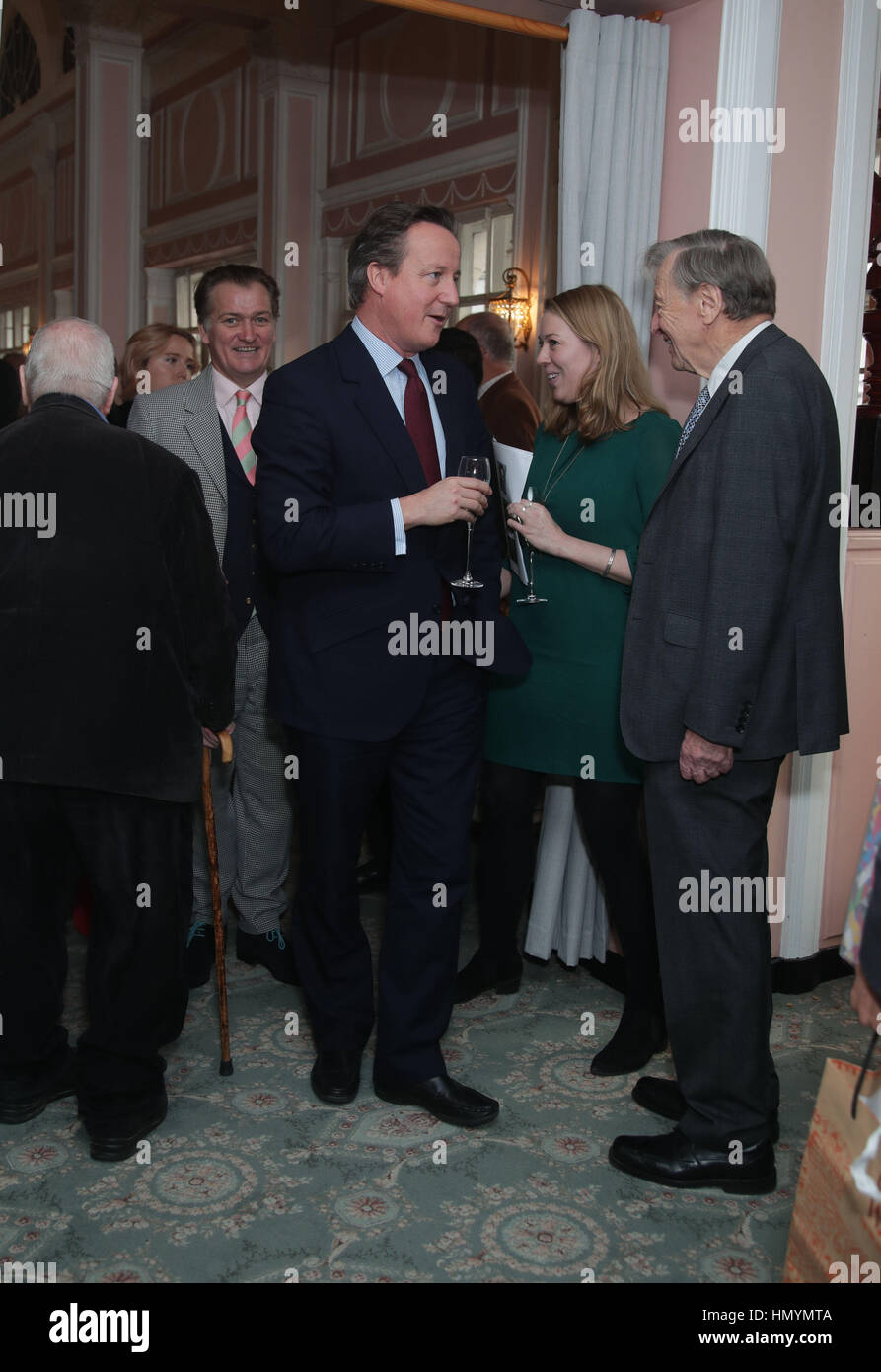 David Cameron talks to Lord Dubs (right) as they attend The Oldie of ...