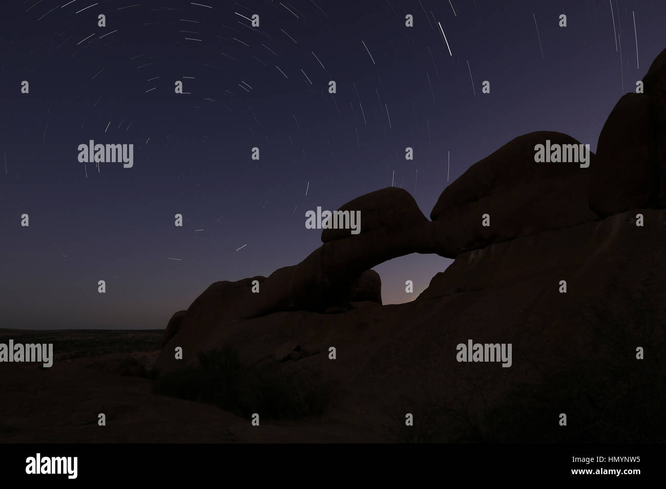 Star trail at the rock arch Stock Photo - Alamy