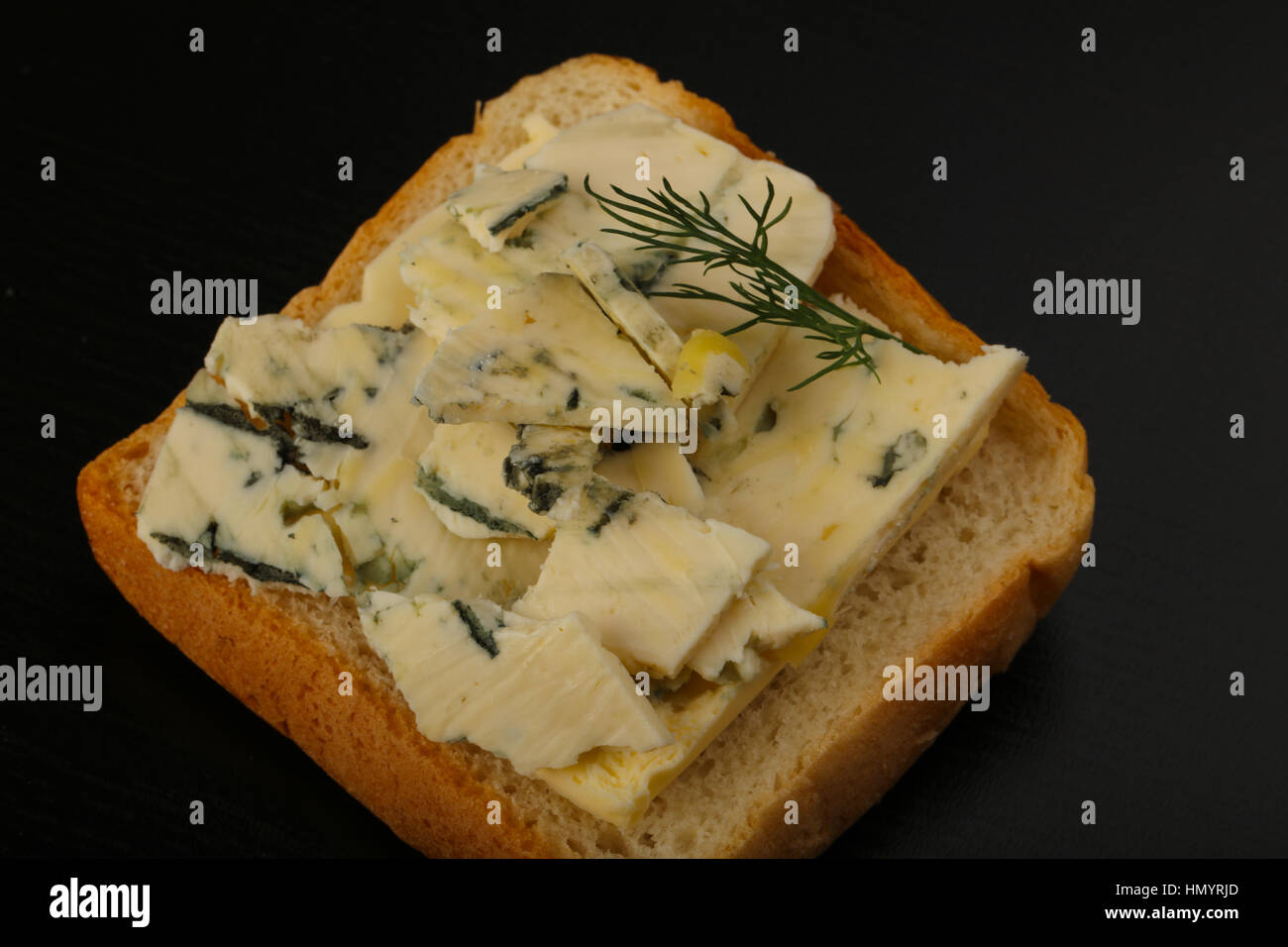 Sandwich with blue cheese on black background Stock Photo - Alamy