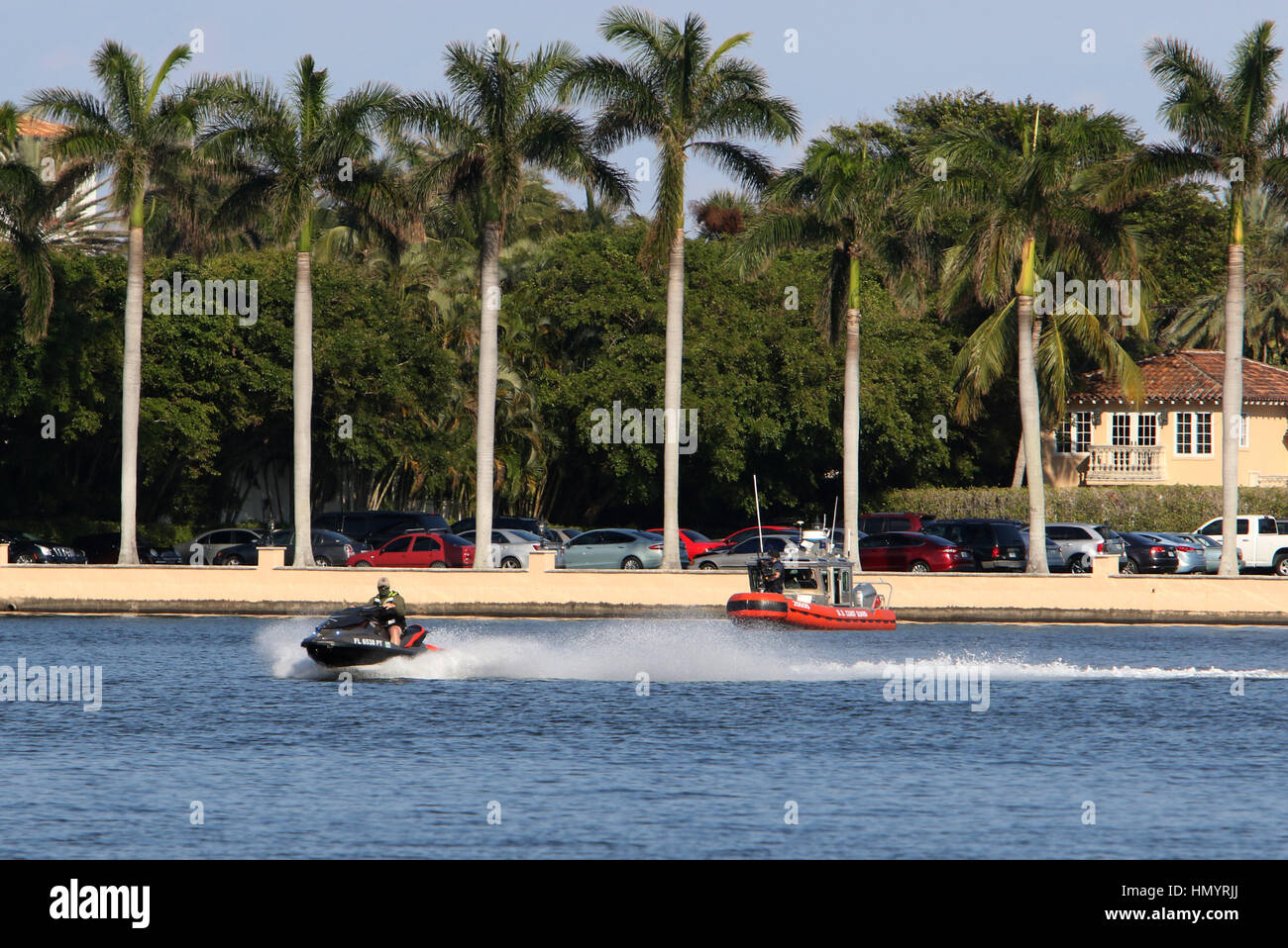 A US Coast Guard 25-Foot Defender Class Boat and a water scooter patrol ...