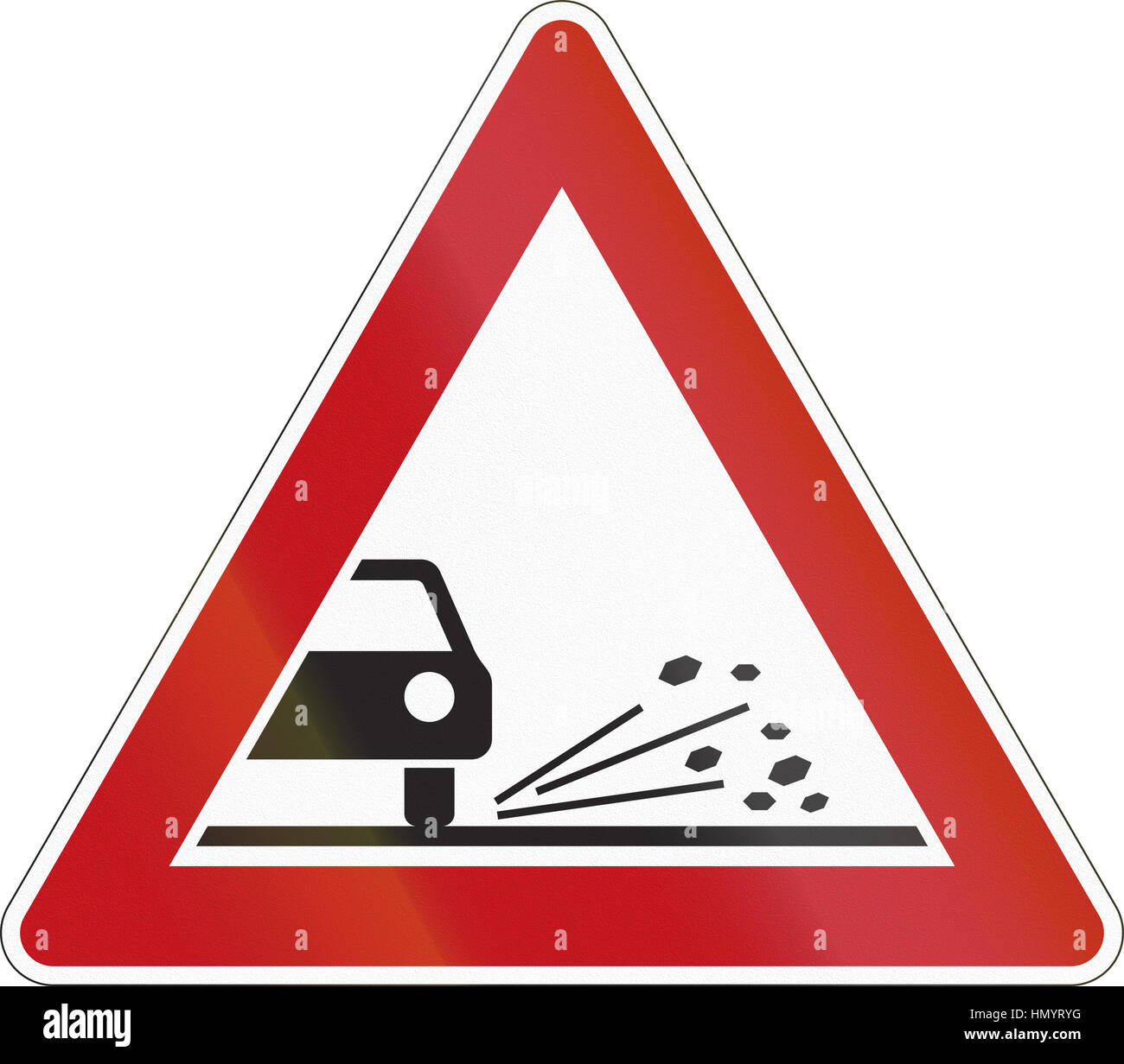 A road warning sign in Germany: Loose chippings Stock Photo - Alamy