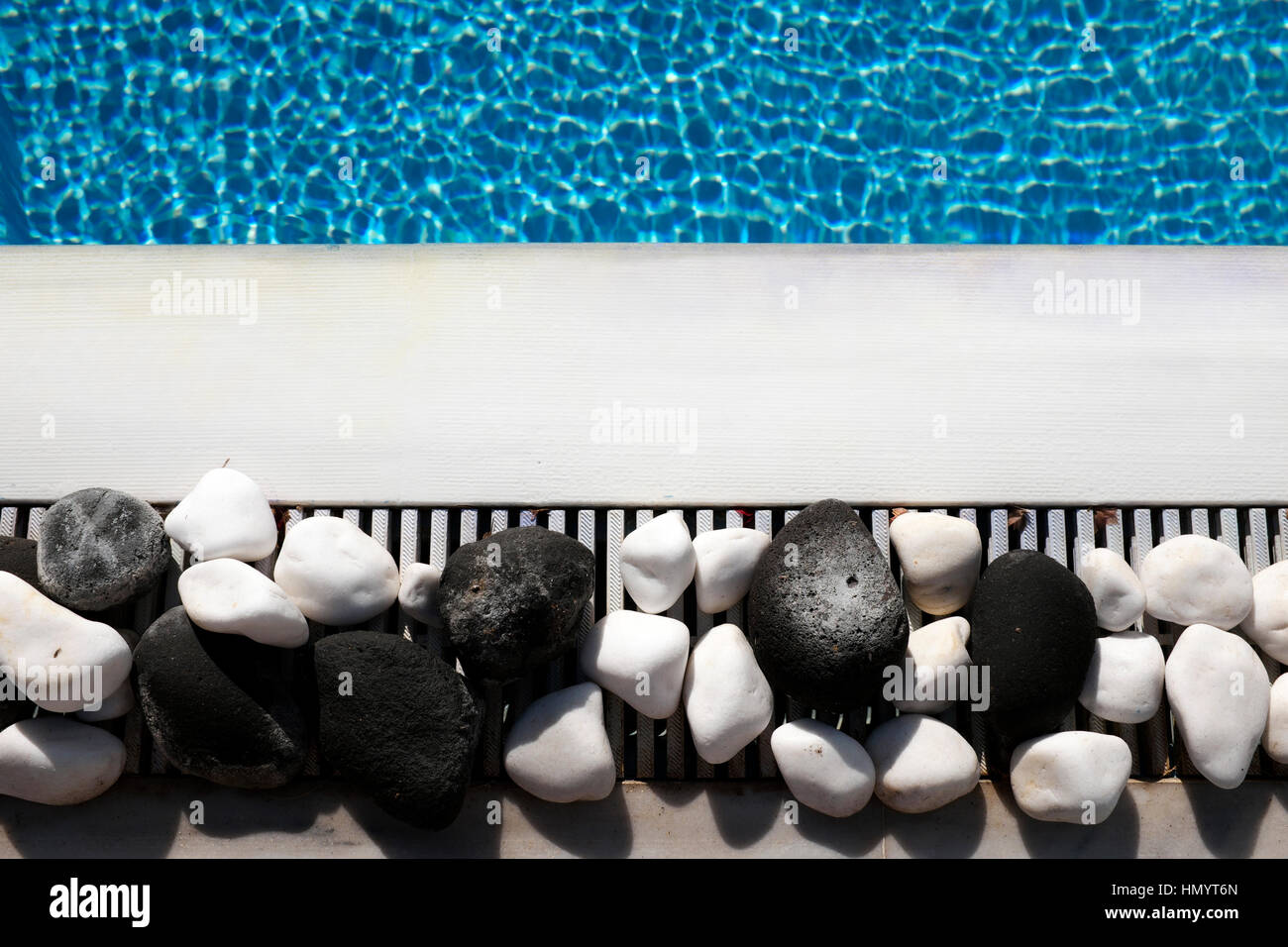 Swimming pool edge with pebbles hi-res stock photography and images - Alamy
