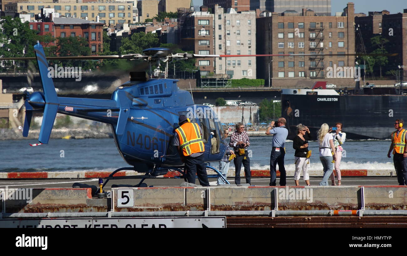 Helicopter Pier And Passengers Stock Photo - Alamy