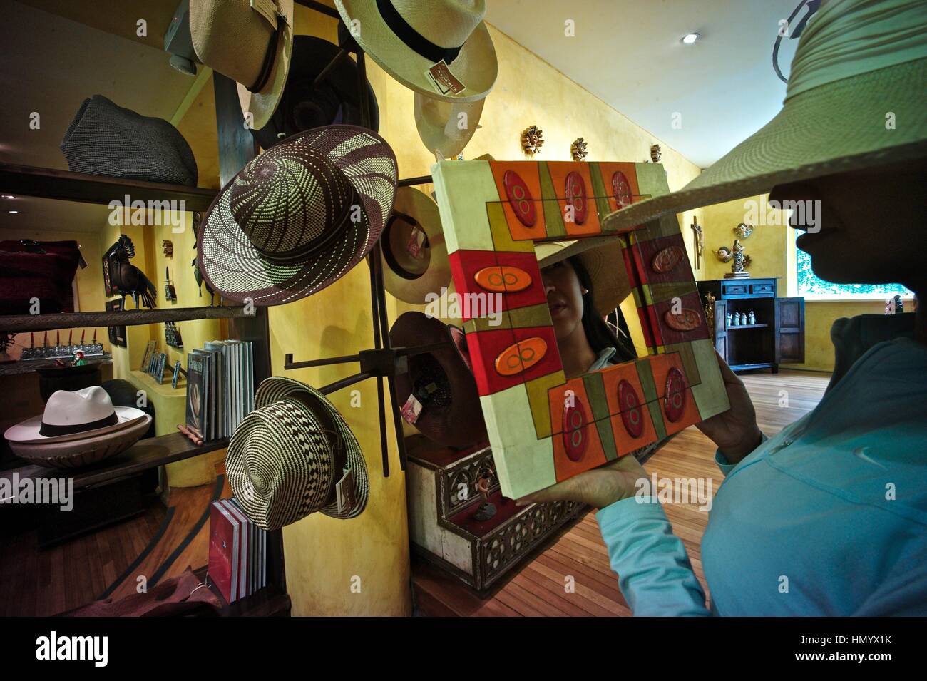 Hat shopping at Olga Fisch high-end boutique Stock Photo - Alamy