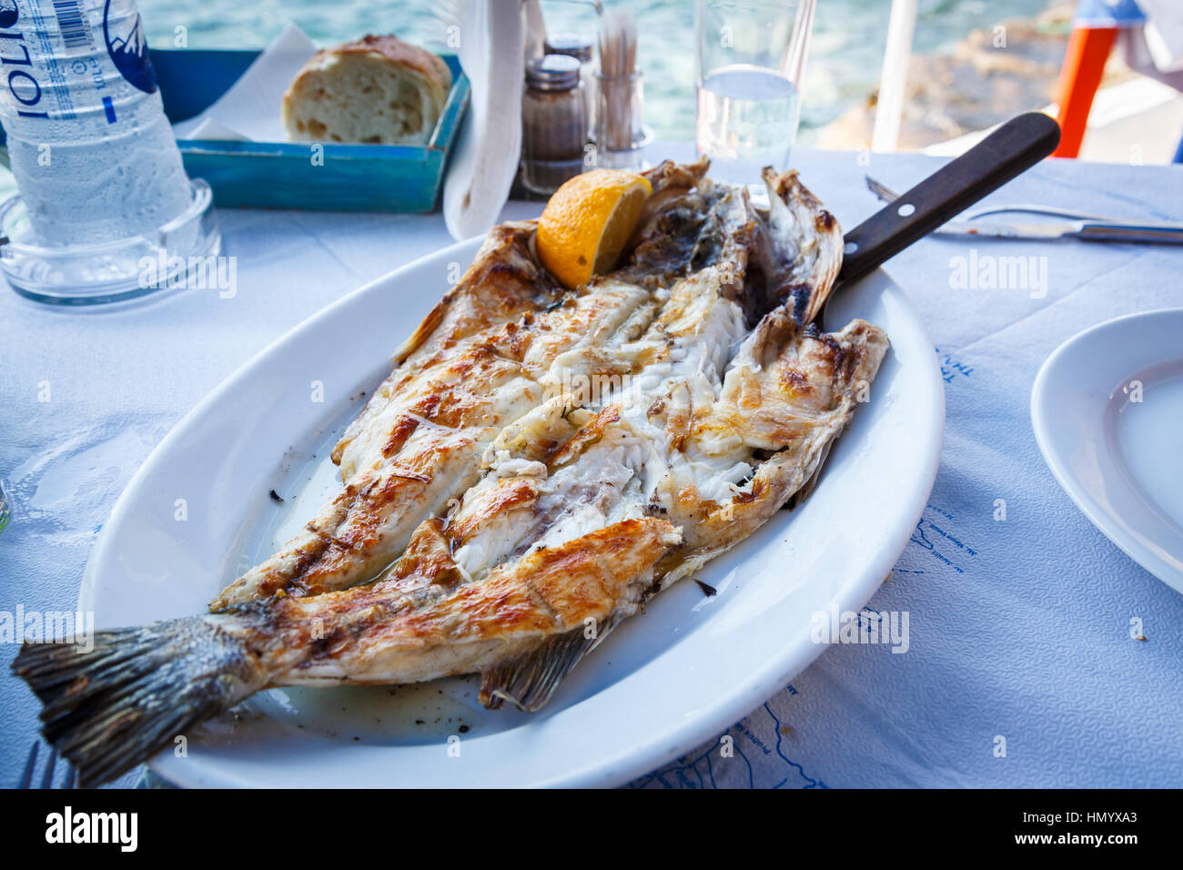 Fish plate grilled table seaside High Resolution Stock Photography and ...