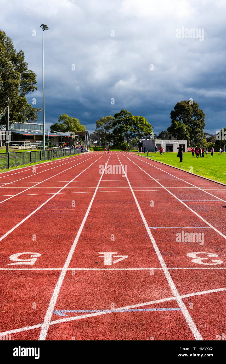 The numbered running lanes on an athletic race track Stock Photo - Alamy