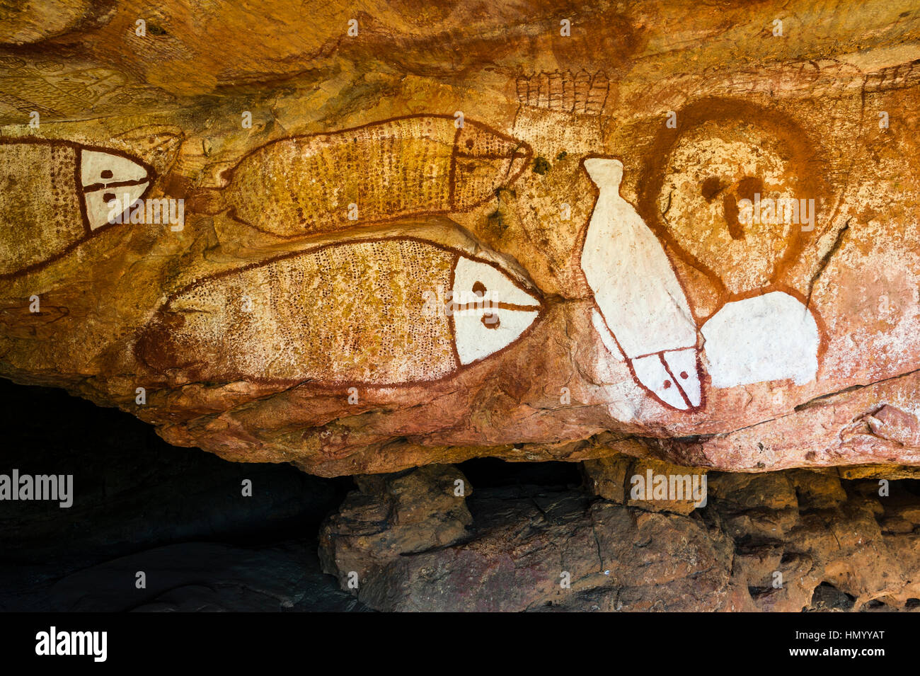 The rich ochre colours of an Aboriginal rock painting gallery featuring ...