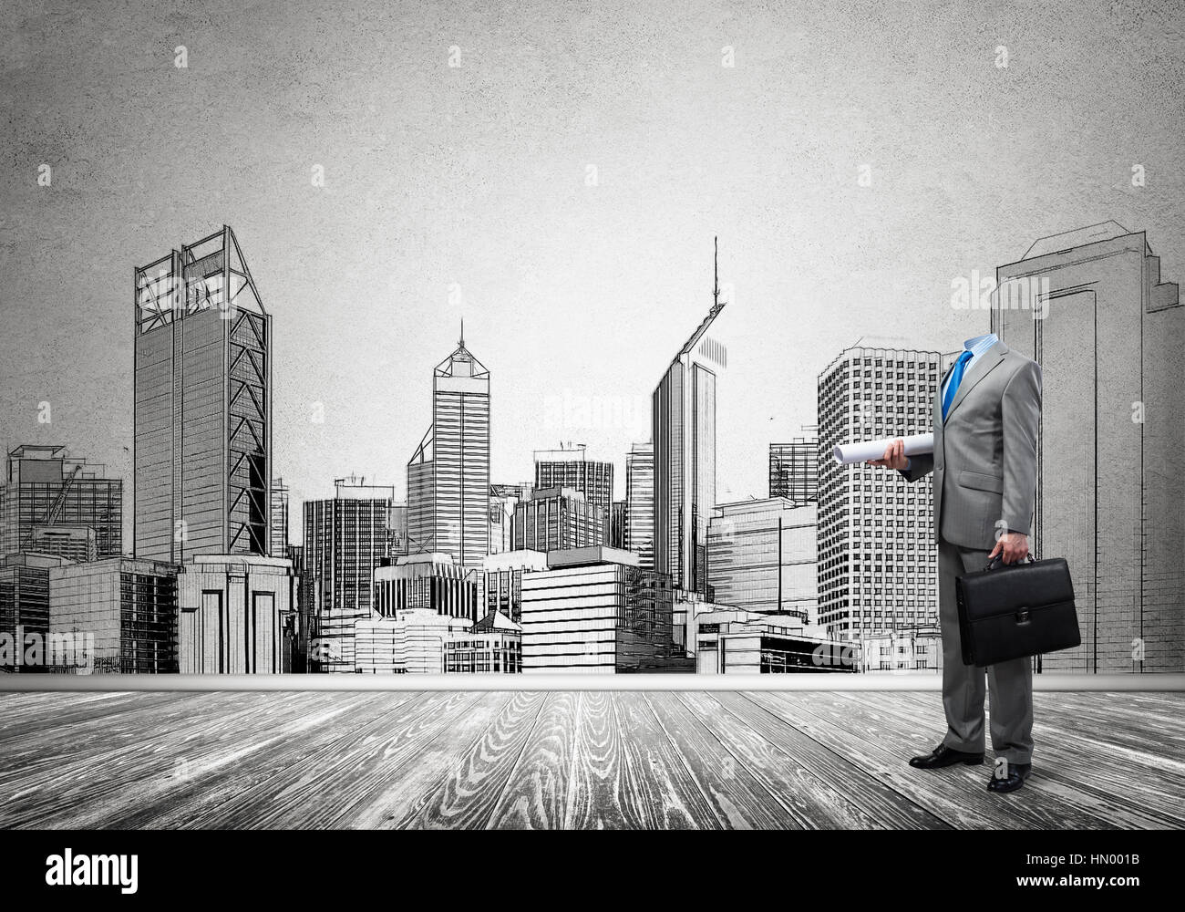 Headless engineer man with papers in hand against construction ...