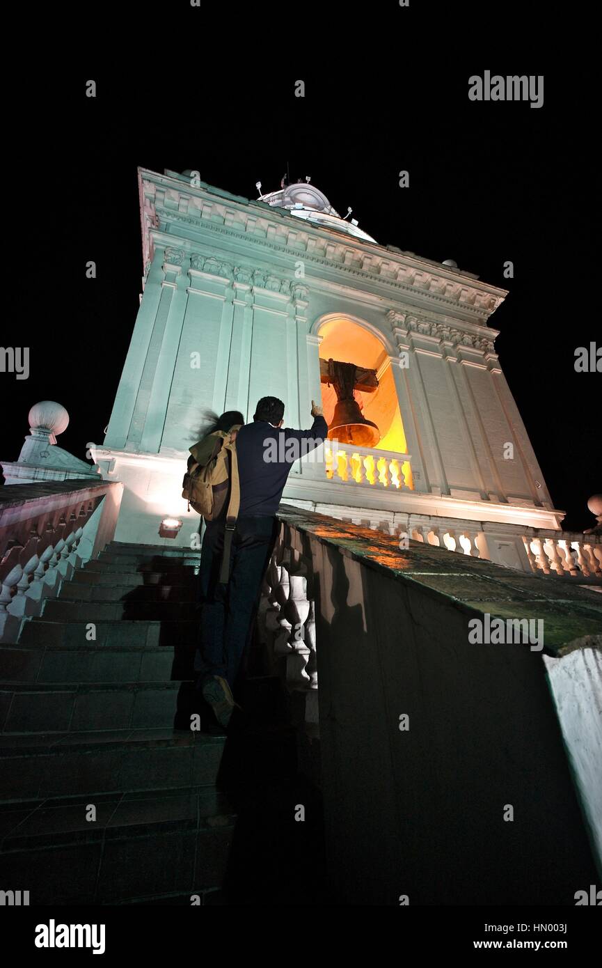 Ecuadorian art city tour guide Julio Rivas explaining a tourist the ...