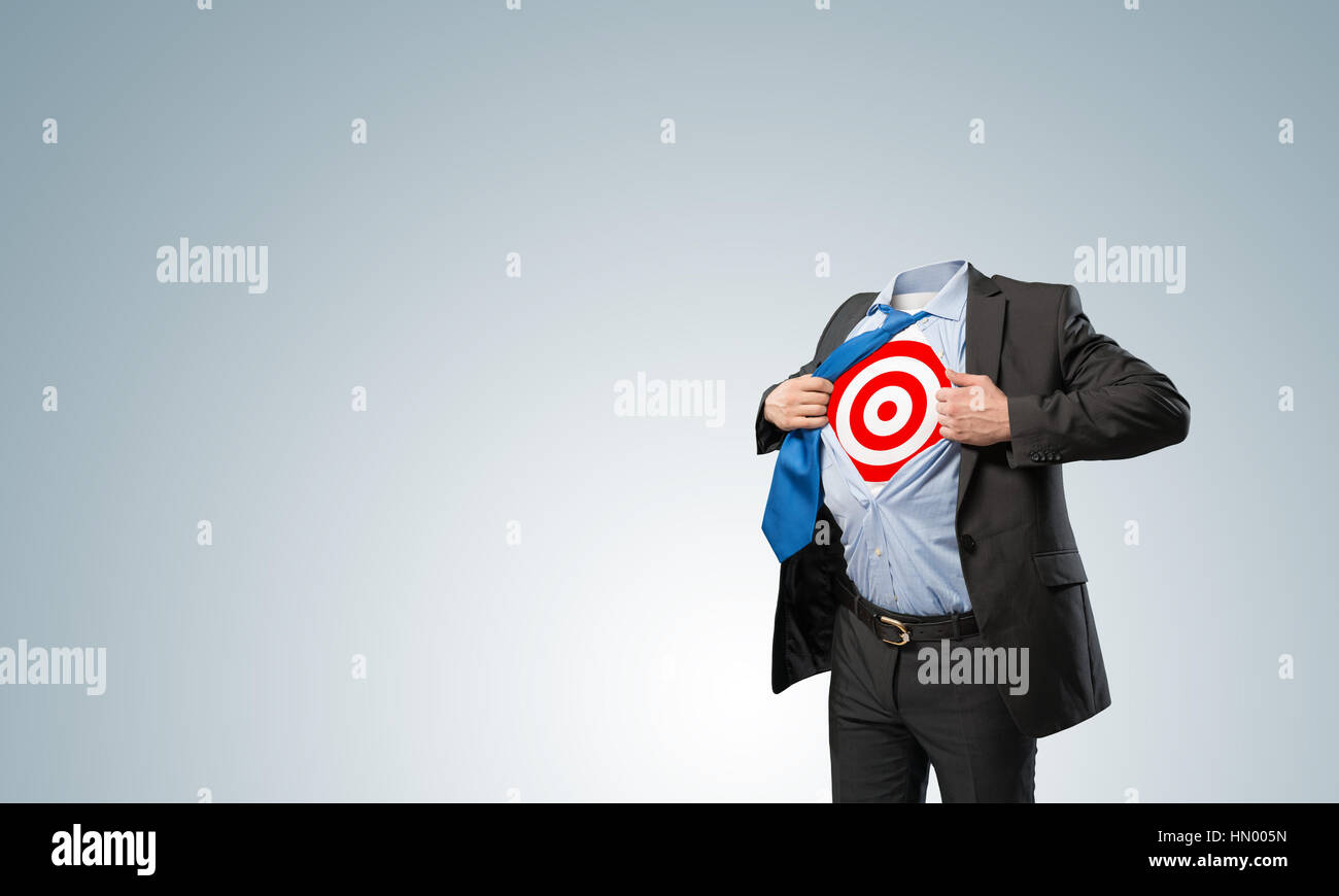 Headless businessman in black suit acting like super hero Stock Photo ...