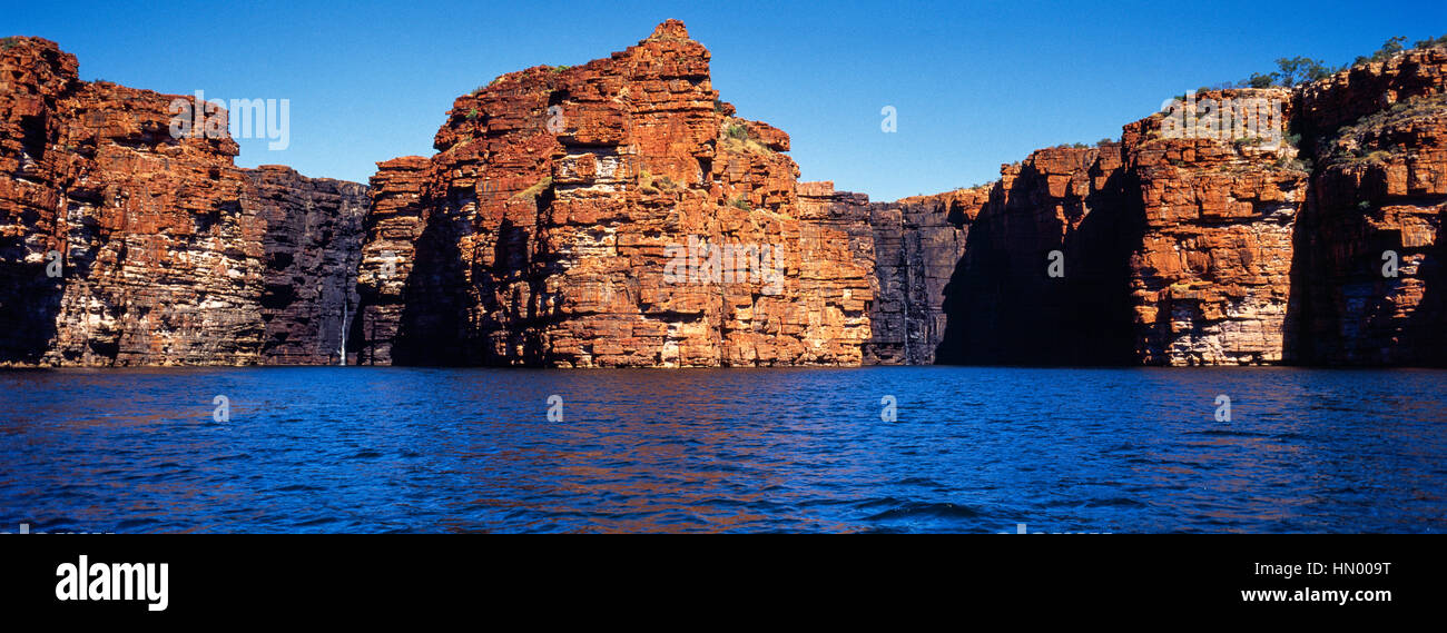 The King George River flows over sheer sandstone walls into a deep ...