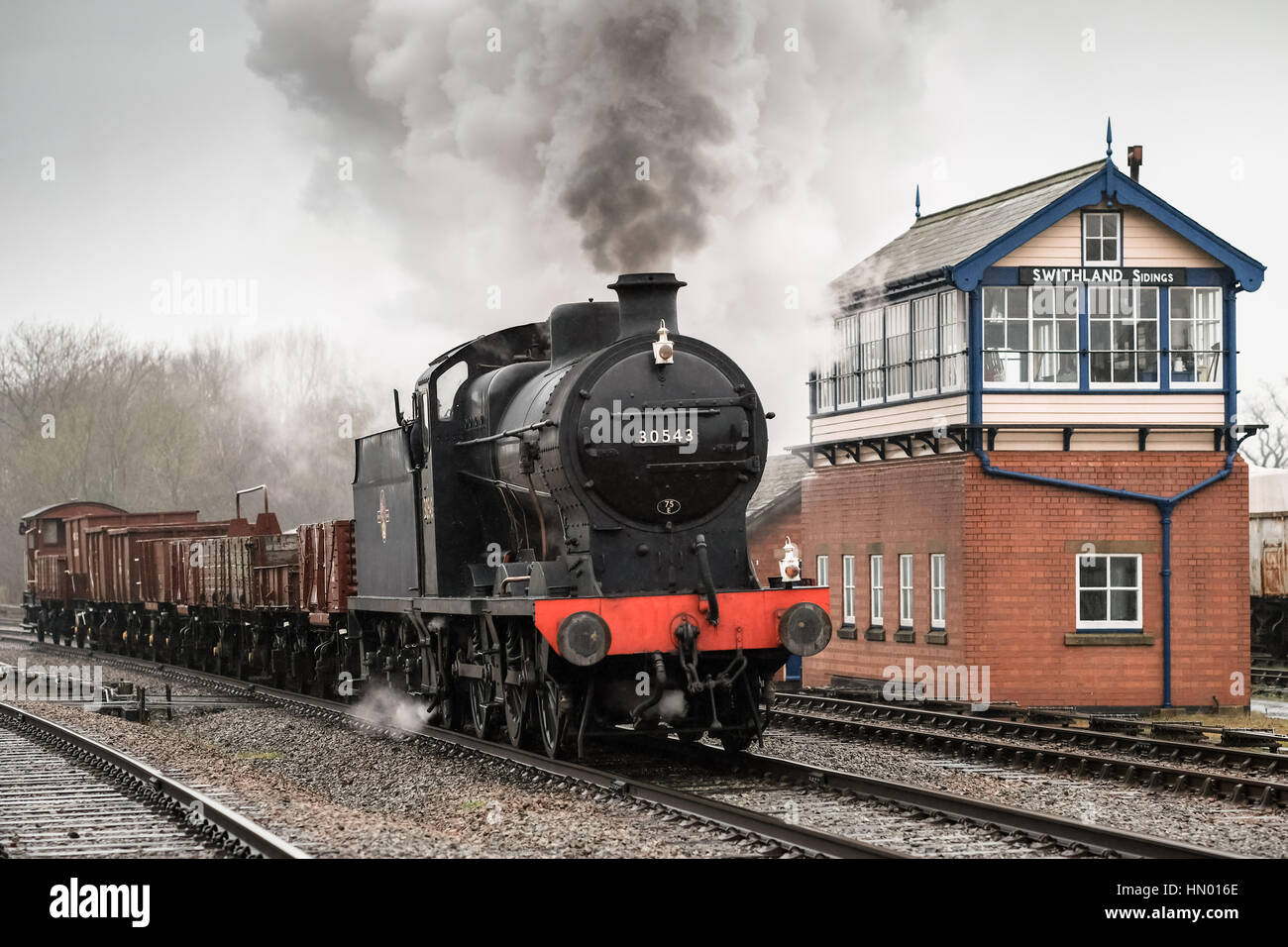 Southern Q Class 0-6-0 No. 30543 passes the Signal Box southbound ...