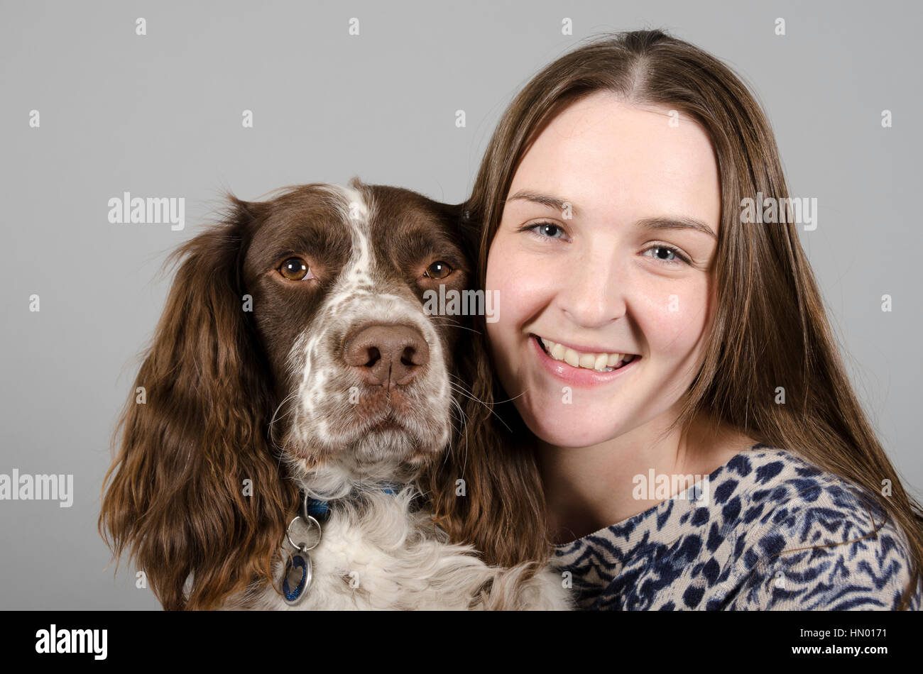 Pet photographed in front of a grey background Stock Photo - Alamy