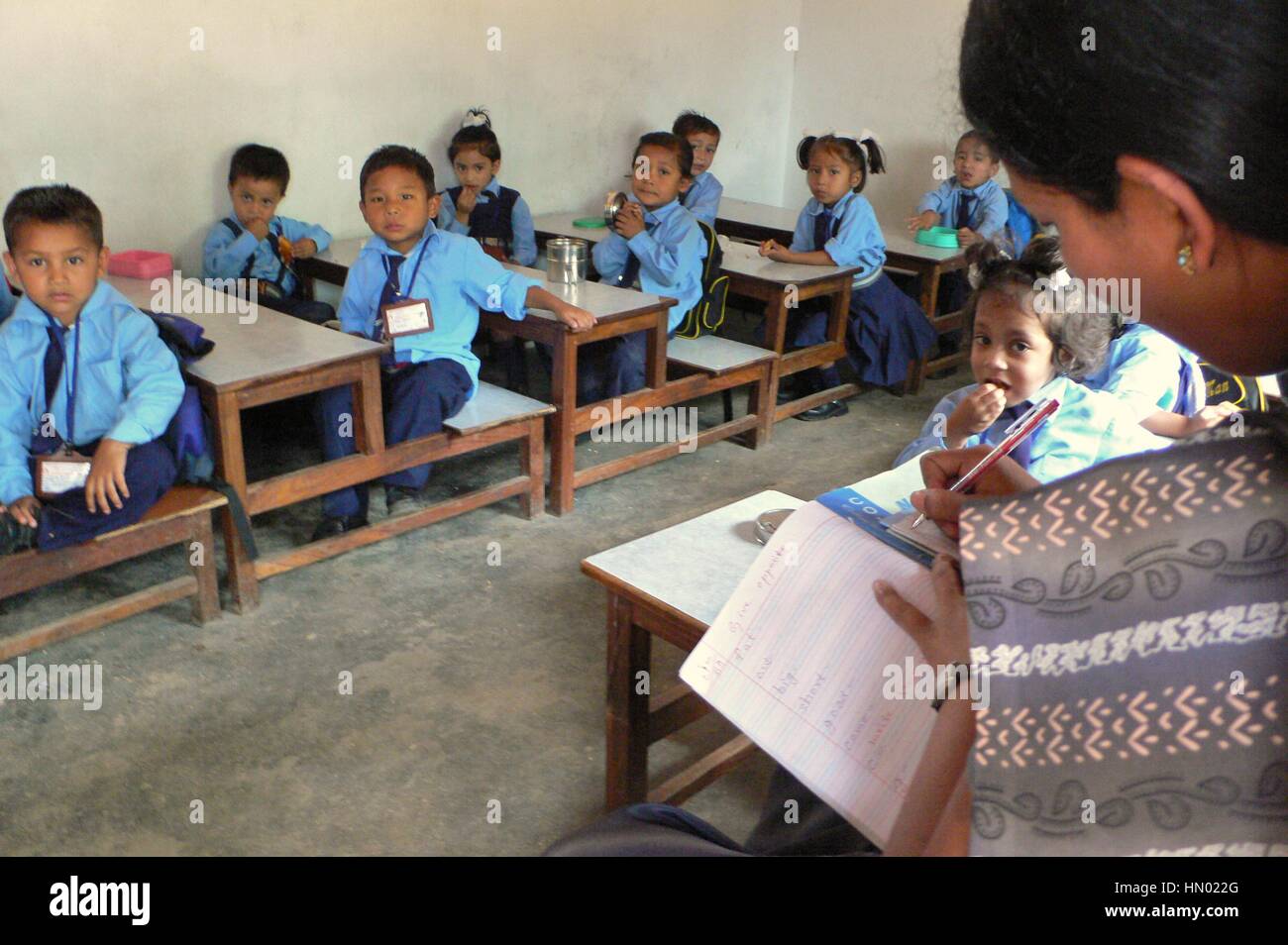 Teacher and students in a classroom B1276 Stock Photo - Alamy