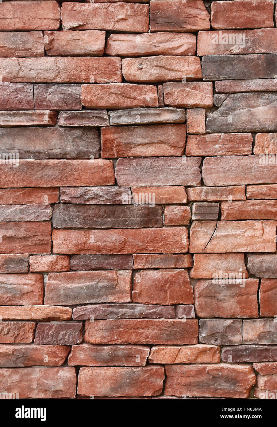 Pattern of old red stone Wall Stock Photo - Alamy