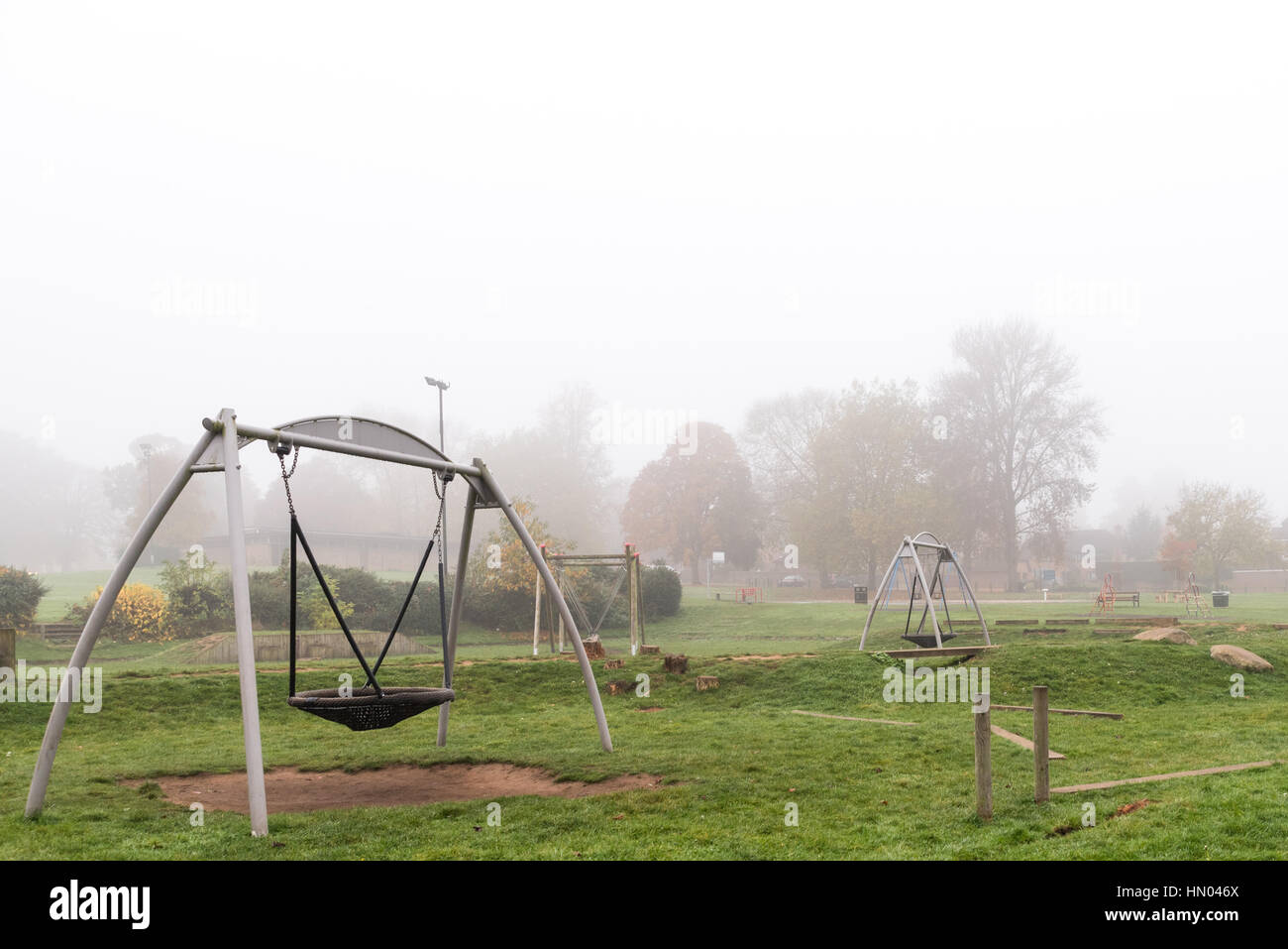 Early morning view of empty playground with fog around it Stock Photo ...