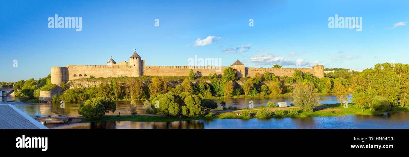 Ivangorod fortress stand on banks of Narva river. Medieval ...