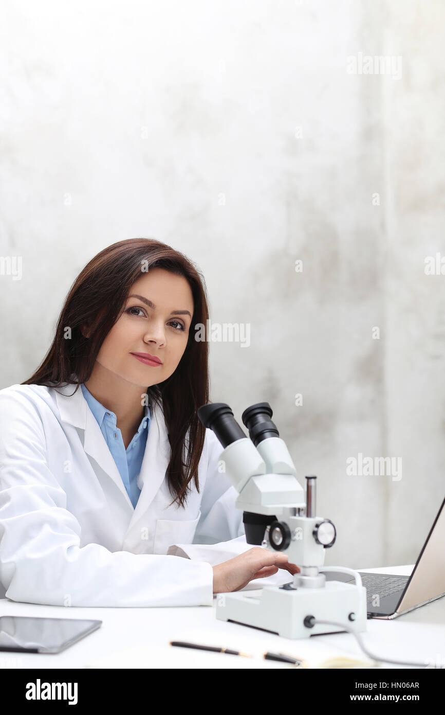 Laptop woman laboratory microscope hi-res stock photography and images ...